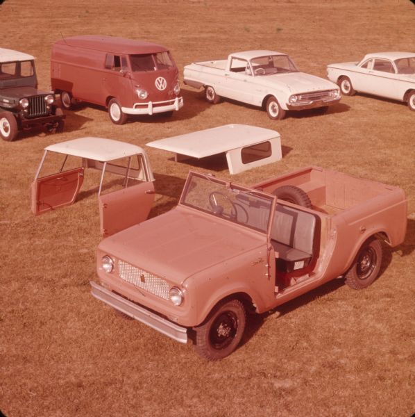 Scout with Other Vehicles | Photograph | Wisconsin Historical Society