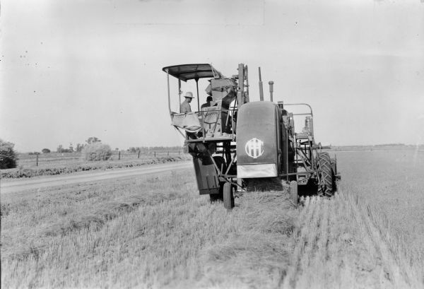 12 ft McCormick-Deering Combine | Photograph | Wisconsin Historical Society