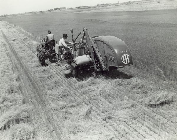 Men Using No. 62 Combine in Flax | Photograph | Wisconsin Historical ...