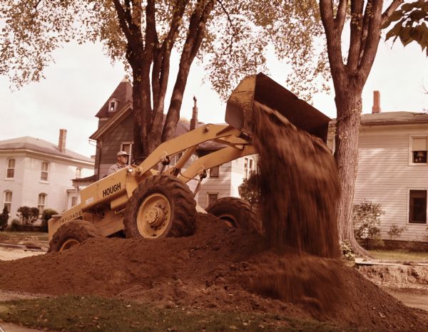 Man Operating Hough Pay Loader | Photograph | Wisconsin Historical Society