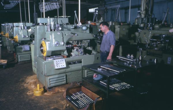 Man Working in Factory in France | Photograph | Wisconsin Historical ...