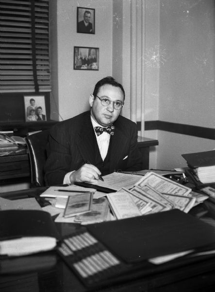 Milt Polland at Desk | Photograph | Wisconsin Historical Society