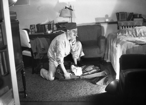 Packing a Suitcase | Photograph | Wisconsin Historical Society