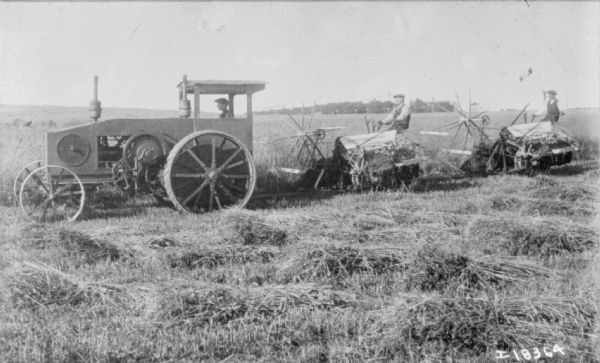Tractor Pulling Two Binders | Photograph | Wisconsin Historical Society