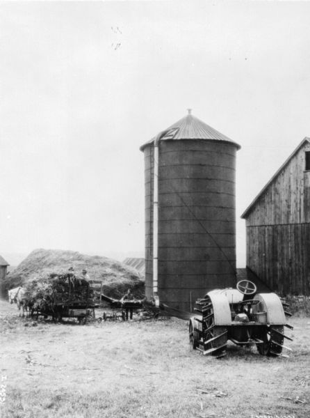 Tractor Powered Ensilage Cutter | Photograph | Wisconsin Historical Society