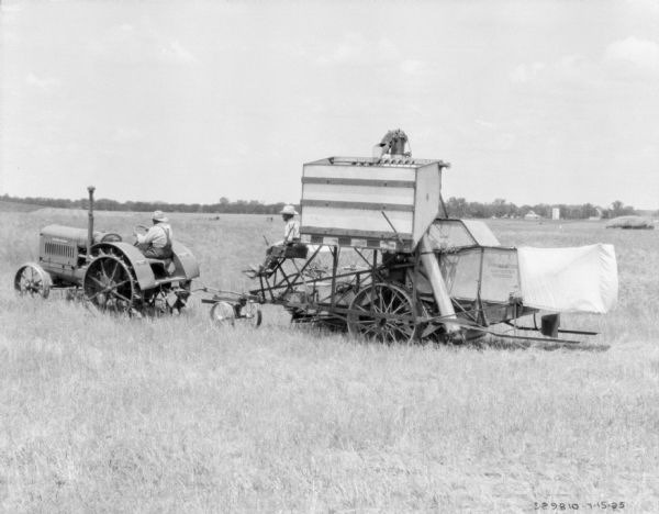Harvester Thresher in Field | Photograph | Wisconsin Historical Society