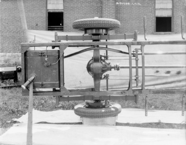 Truck Frame Lying on Side | Photograph | Wisconsin Historical Society