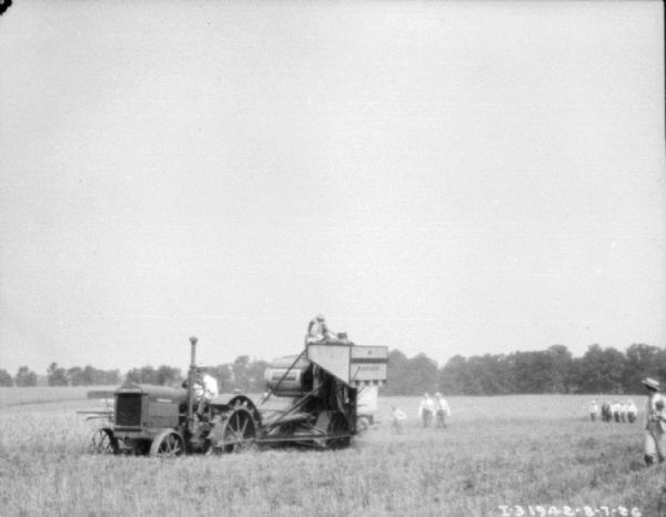 Thresher Operation in Field | Photograph | Wisconsin Historical Society
