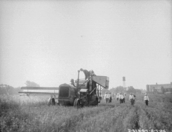 Thresher Operation in Field | Photograph | Wisconsin Historical Society