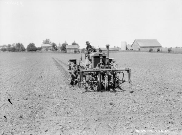 Tractor with Cultivator on Front | Photograph | Wisconsin Historical ...