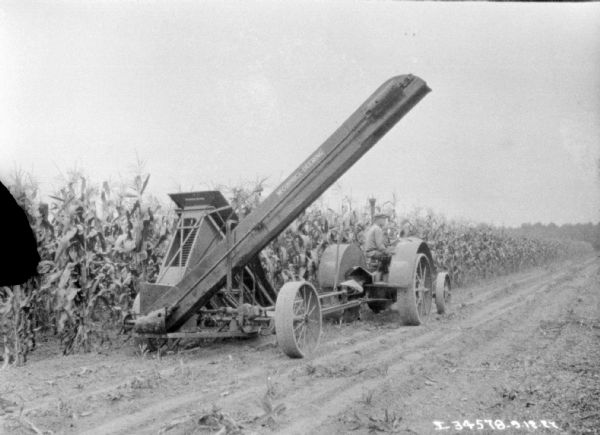 Tractor-Drawn Corn Picker | Photograph | Wisconsin Historical Society