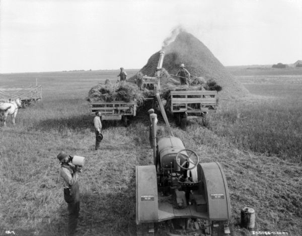 Threshing Operation in Canada | Photograph | Wisconsin Historical Society