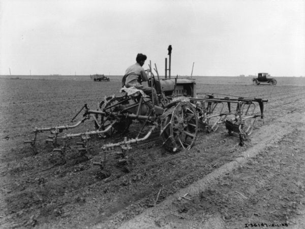 Farmall Mounted Cultivator | Photograph | Wisconsin Historical Society