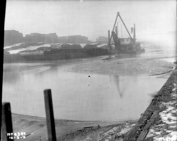 Ship, with Dredge, in Harbor | Photograph | Wisconsin Historical Society