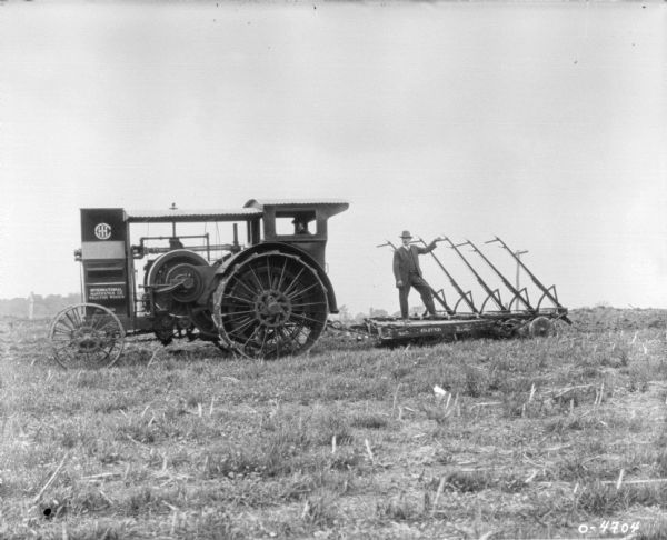 Man Posing on Oliver Plow Pulled by IH Tractor | Photograph | Wisconsin ...
