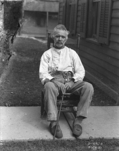 Portrait of Man Sitting Outdoors | Photograph | Wisconsin Historical ...