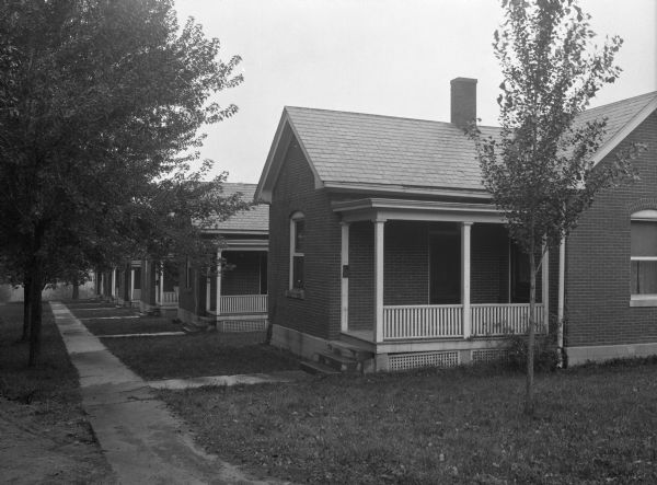 Row of Identical Homes | Photograph | Wisconsin Historical Society