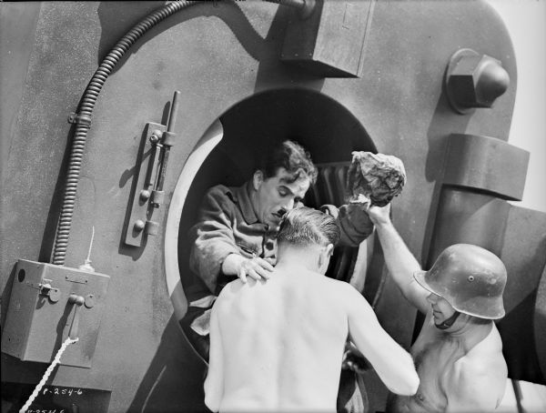 Chaplin in the breech of the big gun, a publicity still for "The Great ...