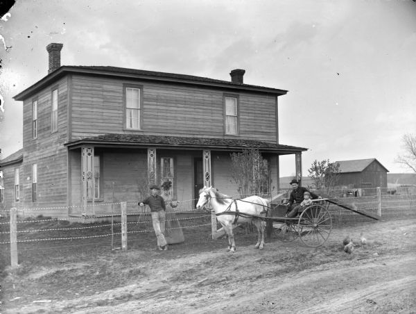 People and a Buggy in Front of a House | Photograph | Wisconsin ...