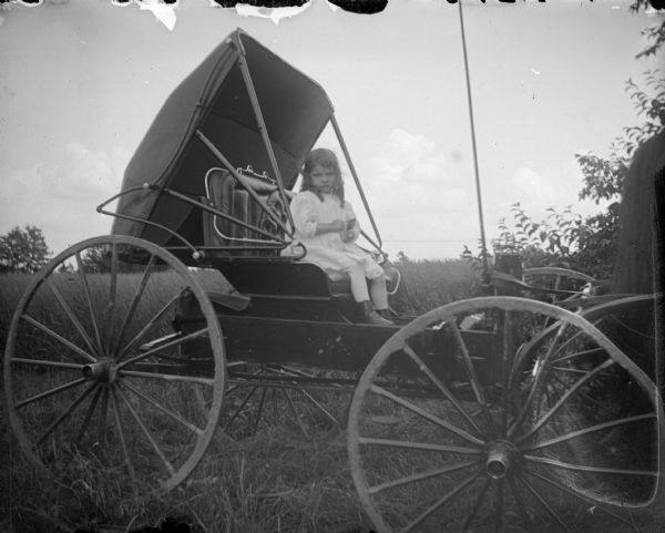 Girl in a Buggy | Photograph | Wisconsin Historical Society