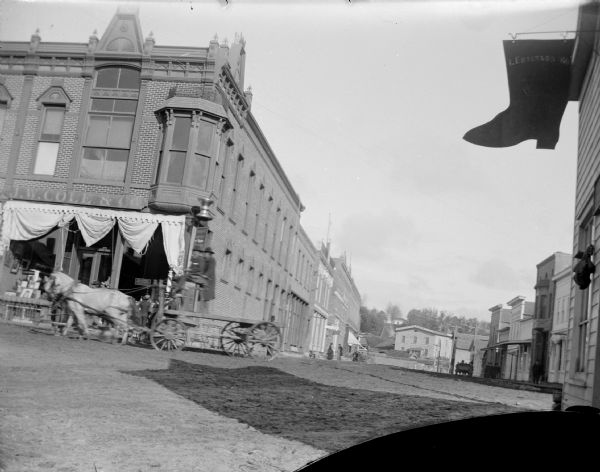 Corner of Main and Water Streets | Photograph | Wisconsin Historical ...