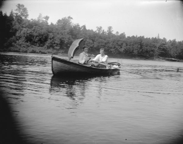 Couple in a Rowboat | Photograph | Wisconsin Historical Society
