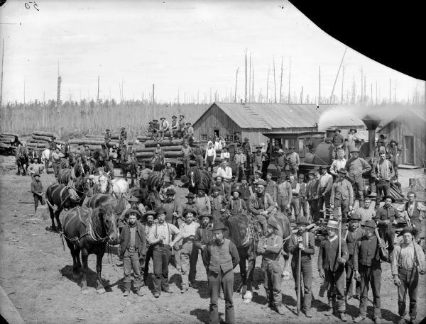 Group of People at Logging Camp | Photograph | Wisconsin Historical Society