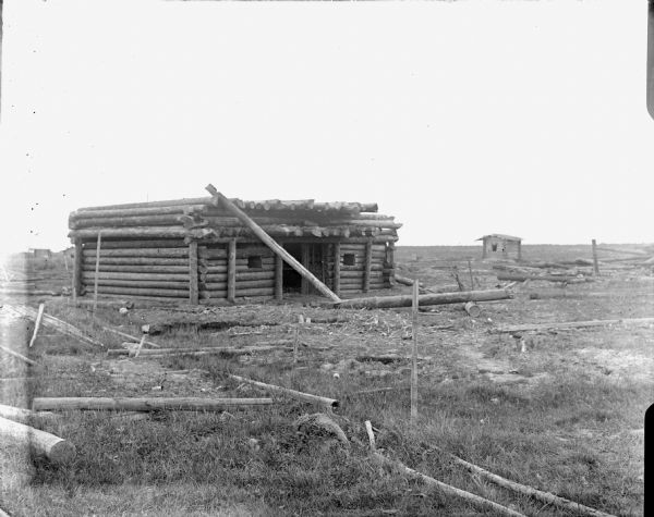 Damaged Log Blockhouse | Photograph | Wisconsin Historical Society
