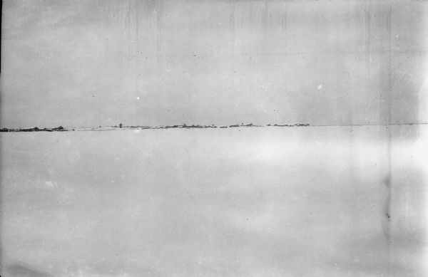 View of Pinega Settlement | Photograph | Wisconsin Historical Society